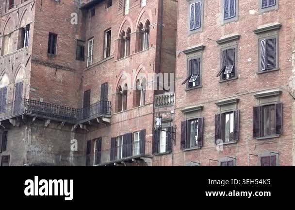 Historic Italian landmark rises within old city, marble stone ...