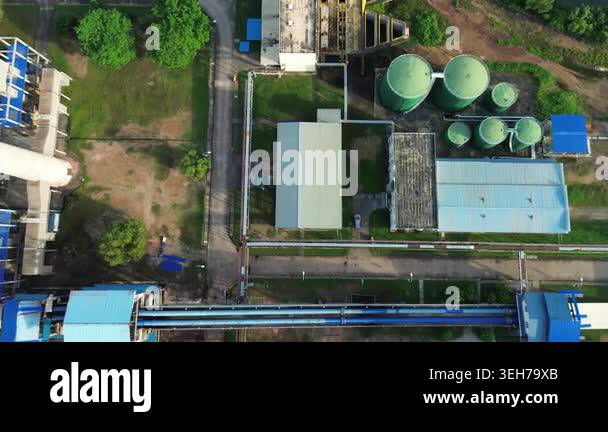 aerial view of oil refinery plant and industrial zone with blue and ...