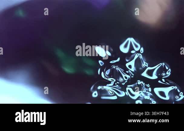 A mesmerizing blue ferrofluid magnetic ocean animation with flowing ...