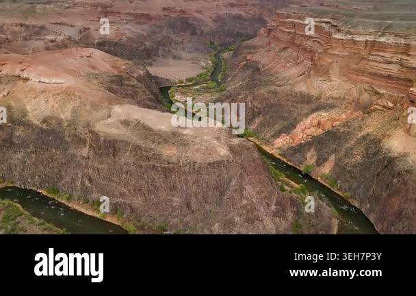 Aerial Drone View of river and red rocks in Valley of Castles at Charyn ...