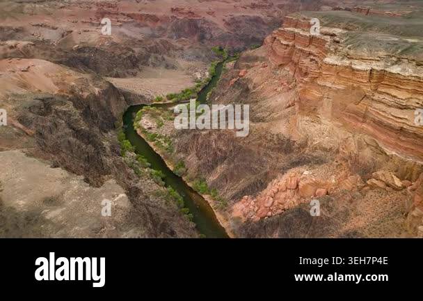 Aerial Drone View of river and red rocks in Valley of Castles at Charyn ...