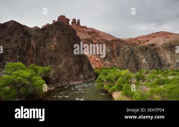 Aerial Drone View of river and red rocks in Valley of Castles at Charyn ...