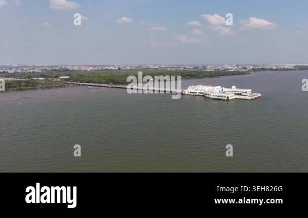 Aerial perspective showing a modern white building situated on the ...