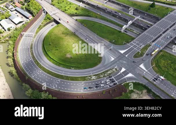 Top down aerial view revealing the intricate design of a modern highway ...