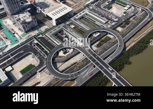 Top down aerial view of a modern elevated highway interchange with ...