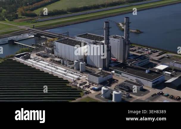 High angle aerial perspective of a modern power plant complex with ...