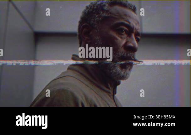 Intense black man closeup portrait vintage vhs glitch, pensive retired ...