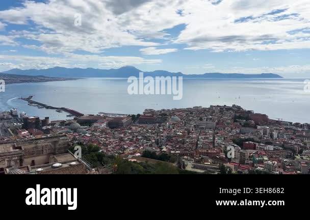 panoramic cityscape Naples with Vesuvius volcano at sunset, Italy Stock ...