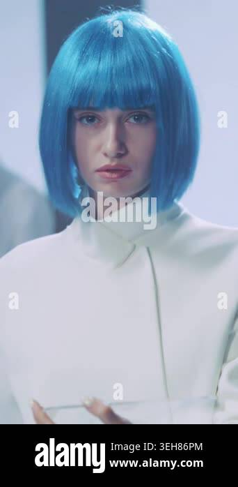 white woman blue wig operating transparent interface in crisp white ...