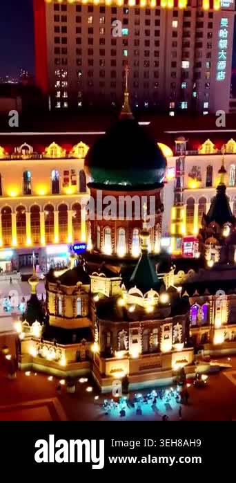 See the bright lights of Harbin City in China as a drone captures ...