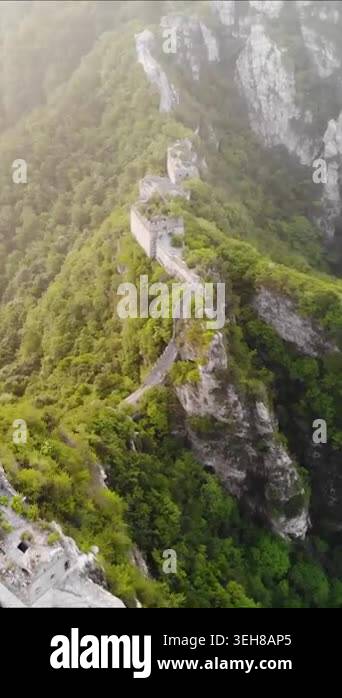 A drone takes you over the Great Wall of China. You see the structure ...
