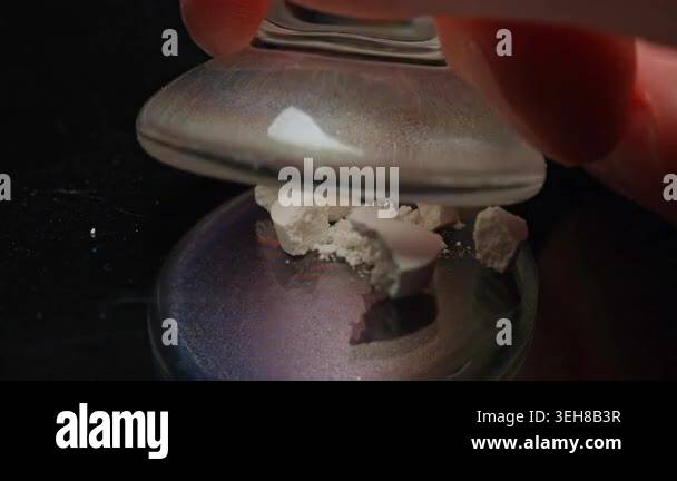 Addictive person crushing prescription opioid drug of fentanyl to ...
