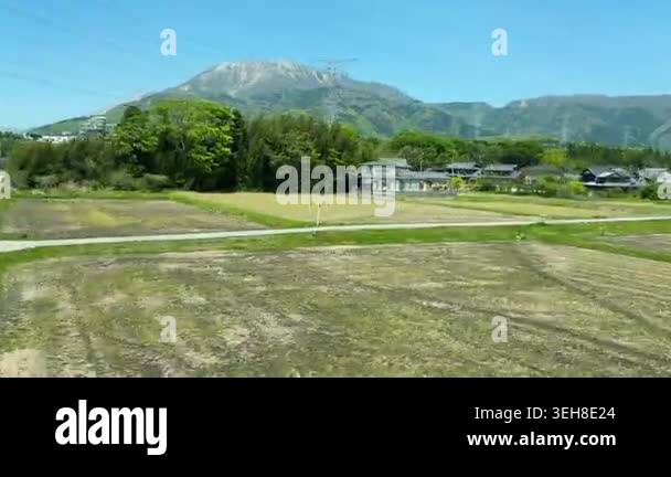 Majestic Mount Ibuki in the background under bright sunny daylight ...