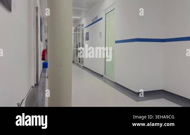Modern hospital corridor in Germany with blue navigation line that ...