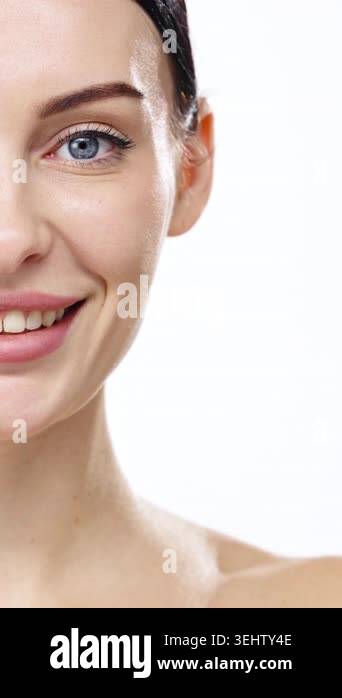 Smiling young woman with fair skin and light hair, close-up portrait ...