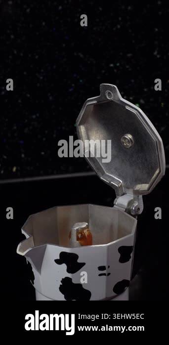 Close-up of coffee brewing in a moka pot, vertical format Stock Video ...