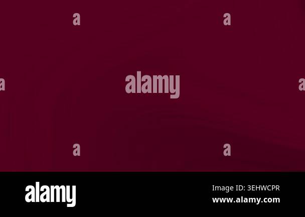 Solid dark red fabric background with subtle texture, creating a rich ...