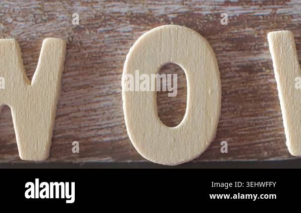 wooden letters with the written message "wow Stock Video Footage - Alamy