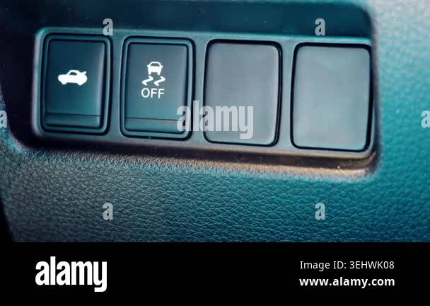 Car traction control off and trunk release dashboard switch buttons ...