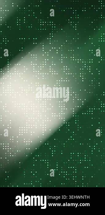 Abstract pattern of white dots on a green background with a bright ...
