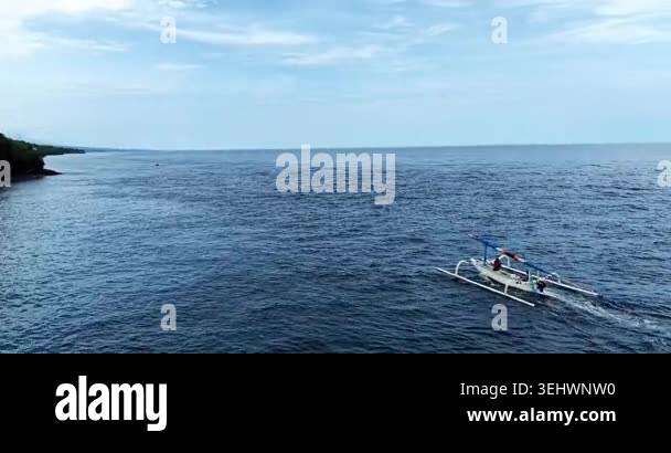 Drone aerial view of a traditional Balinese jukung fishing boat ...
