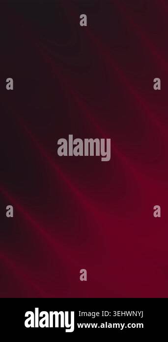 Abstract gradient background featuring deep red and black tones with ...
