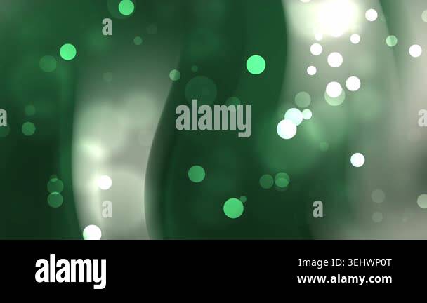 Abstract design featuring green shapes and soft bokeh lights in a ...
