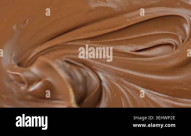 Stirring process of smooth chocolate spread. Macro abstract view Stock ...