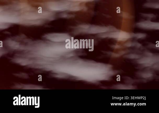 Abstract blurred background featuring soft white and dark tones with ...