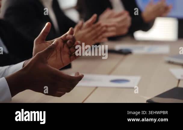Happy multiethnic team hands applaud to show support at desk in ...