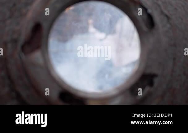Distressed metal port hole window frames a soft and blurred abstract ...