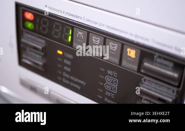 Close-up of a modern washing machine digital control panel with ...