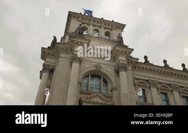 Berlin, Germany - 26.07.2025: Stone tower of the Reichstag features ...