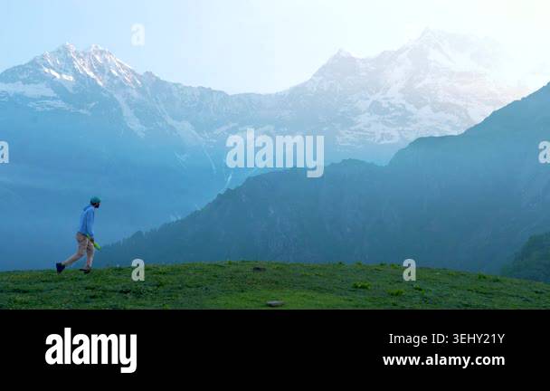 Panoramic view of snow-capped Himalayan mountains with layered ridges ...