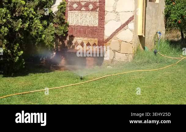 video of an industrial sprinkler system in action, effectively watering ...