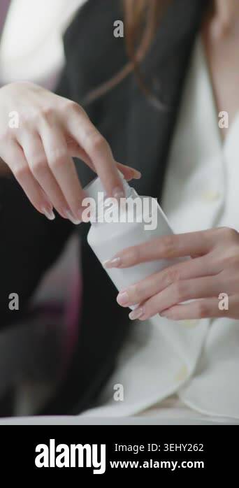 Businesswoman opening white bottle with pills inside Stock Video ...