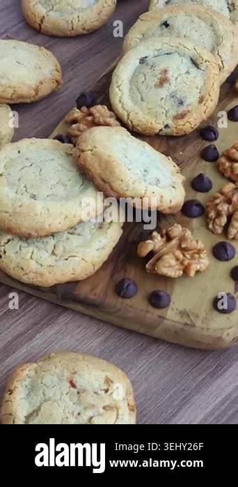 Close-up view of homemade cookies with chocolate chips and walnuts ...