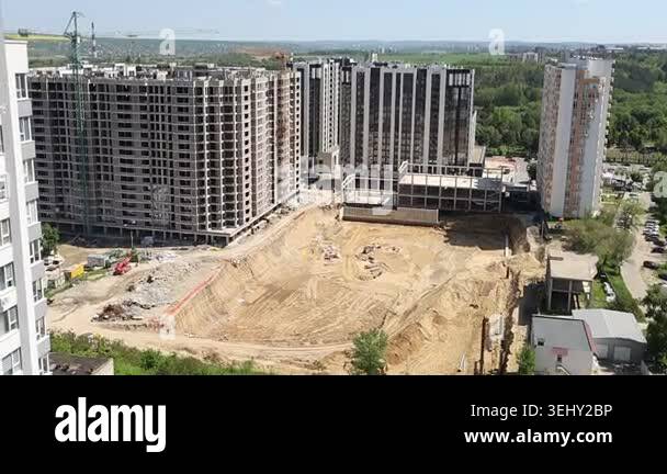 Aerial construction site excavated foundation view project manager ...