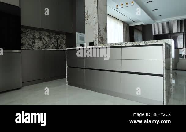 Luxury kitchen island with marble slab countertop and integrated ...