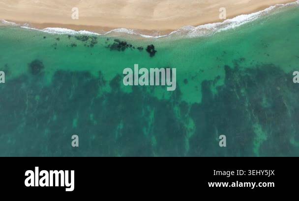 Aerial footage of beach and sea water landscape Stock Video Footage - Alamy