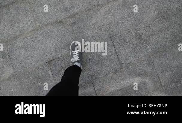 top view of person in sneakers walking Stock Video Footage - Alamy