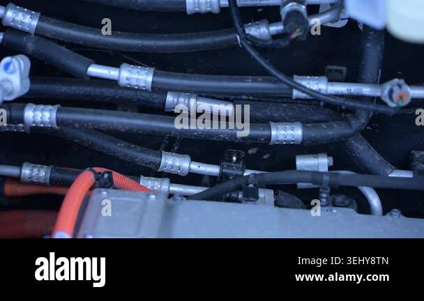 Space near the electric car engine. Close view of intricate automotive ...