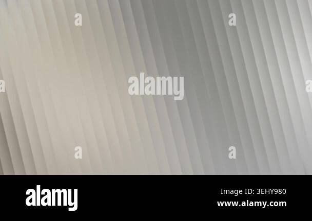 Subtle interplay of light and shadow on a textured surface, creating a ...