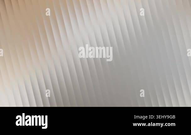 Vertical blinds with soft light creating a subtle striped pattern and a ...