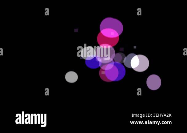 Abstract bokeh effect with colorful circles and squares on a black ...