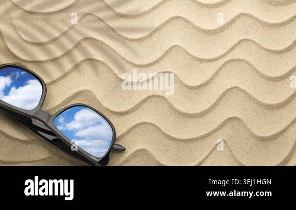 Beach sand with sunglasses and palm tree shadows, looping animation ...