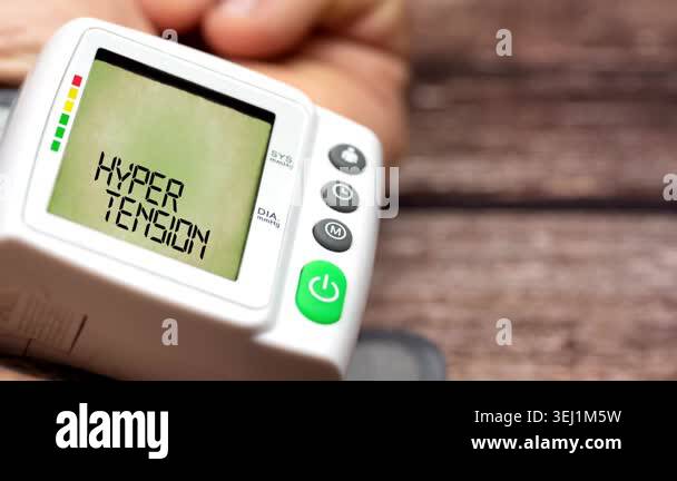 Blood pressure monitor and a warning about high blood pressure ...