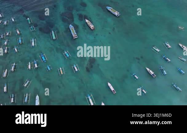 Aerial Top Down View of Traditional Outrigger Boats Anchored in ...