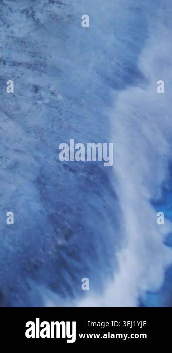 Vertical video. Splash drip. Ink water. Defocused blue white colorful ...
