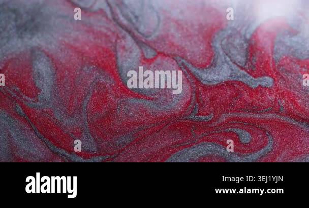 Ink splatter. Spill texture. Defocused red silver colorful blend ...